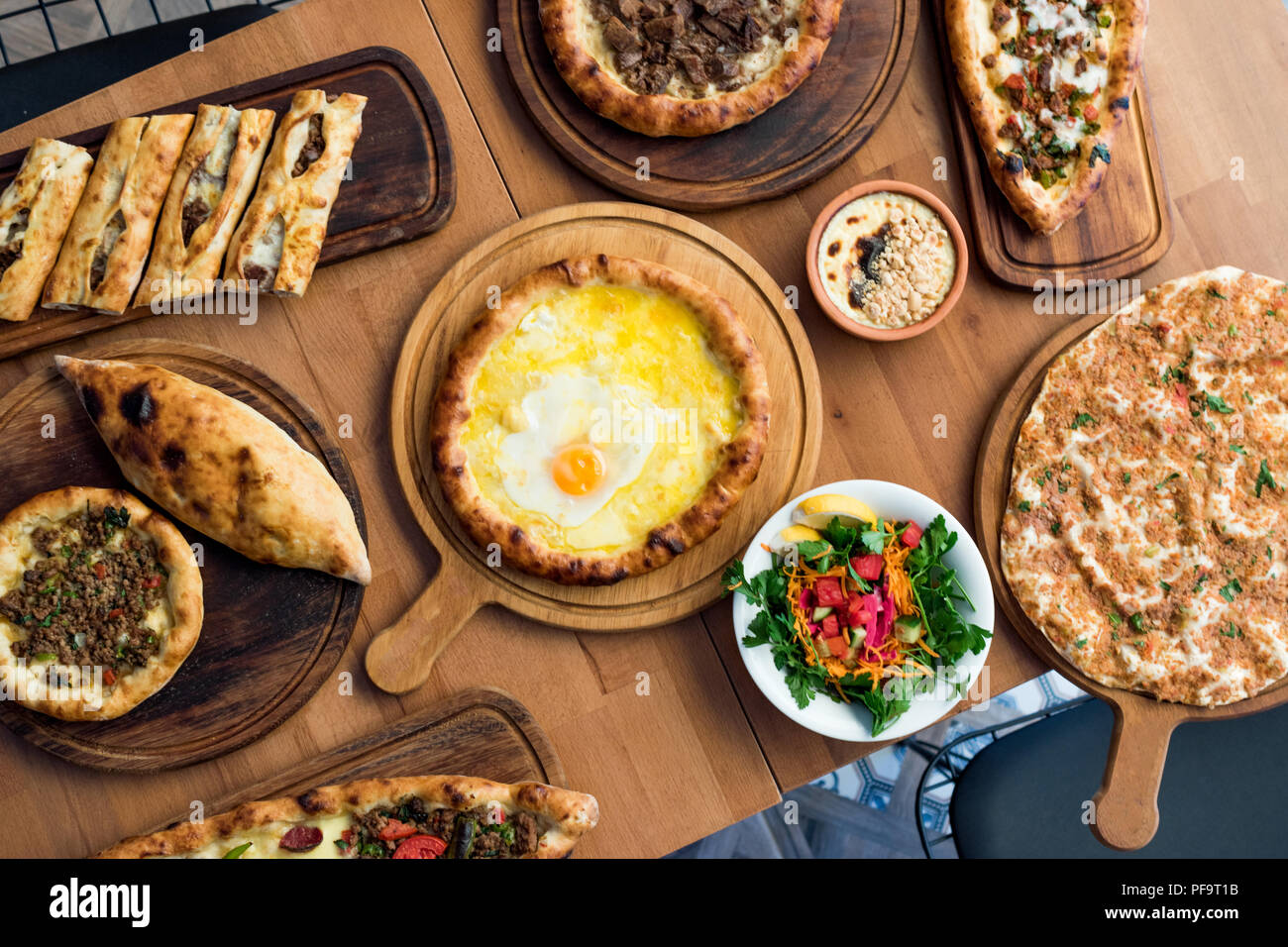 Variety of Turkish Pide Traditional food with beef, Cheese, Fried Egg ...