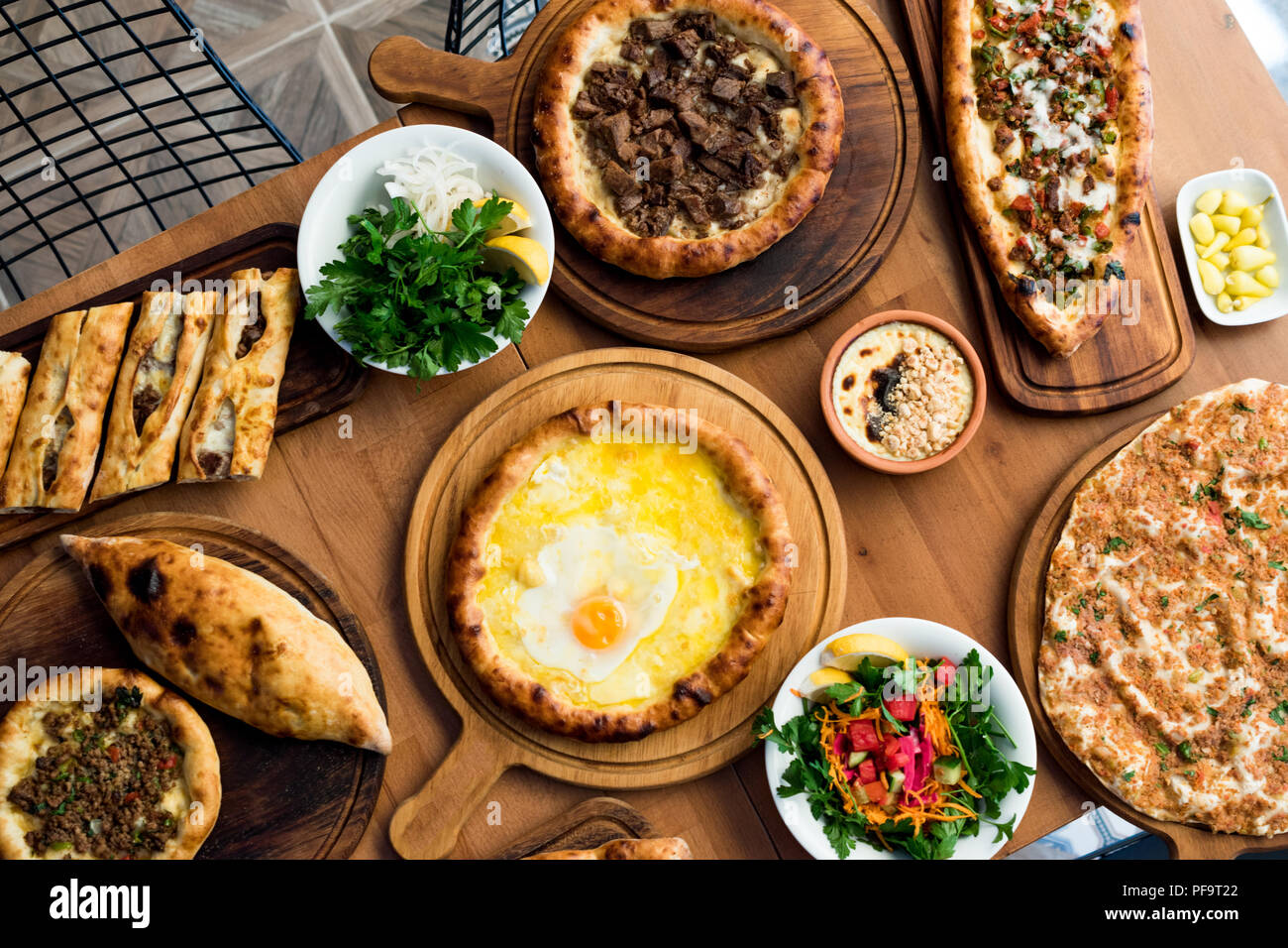 Variety of Turkish Pide Traditional food with beef, Cheese, Fried Egg ...