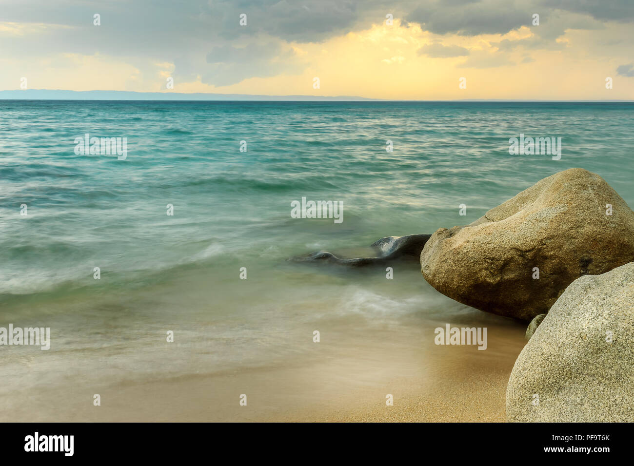 Beach rocks turquoise water hi-res stock photography and images - Alamy
