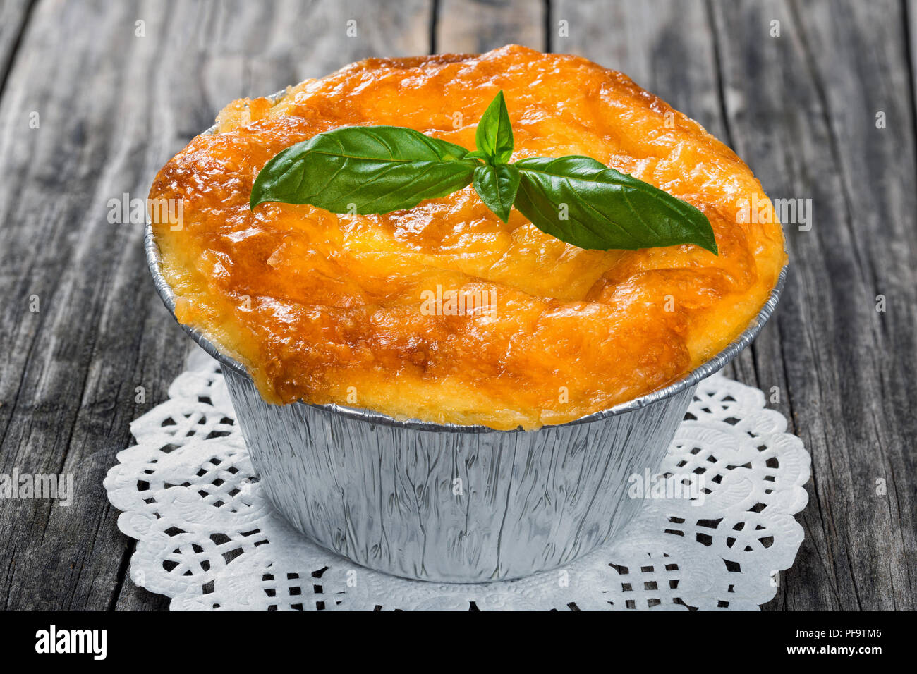 French dish julienne. Mushroom, chicken and cheese gratin in Aluminum ...