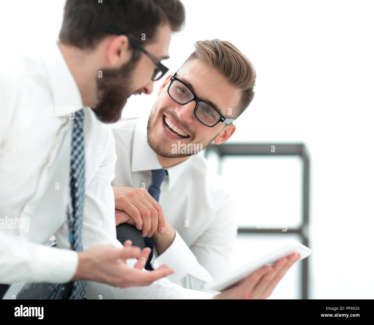 close up. two successful employees work together Stock Photo - Alamy