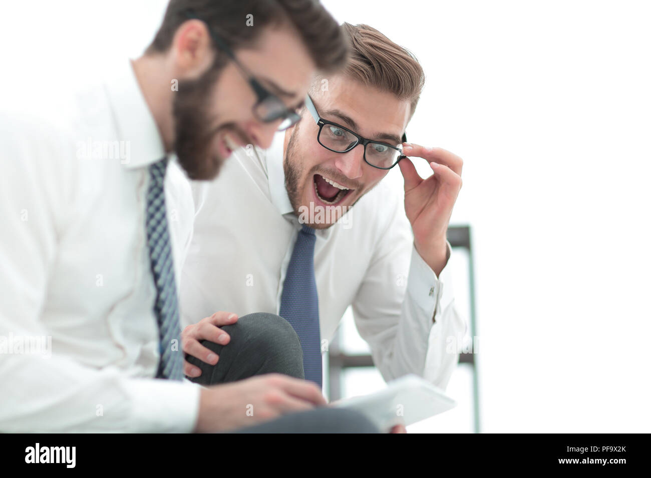 close up.two surprised employees in the workplace Stock Photo - Alamy