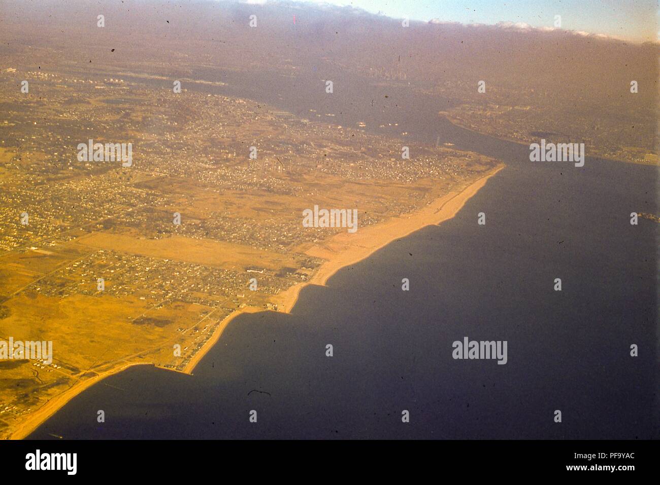 Aerial view facing northeast of New York Harbor, the coastline of ...
