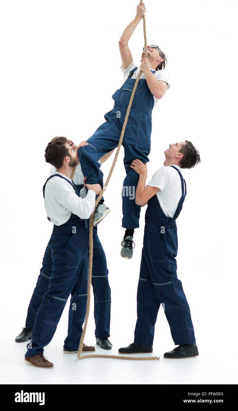 Man in action of pulling rope hi-res stock photography and images - Alamy