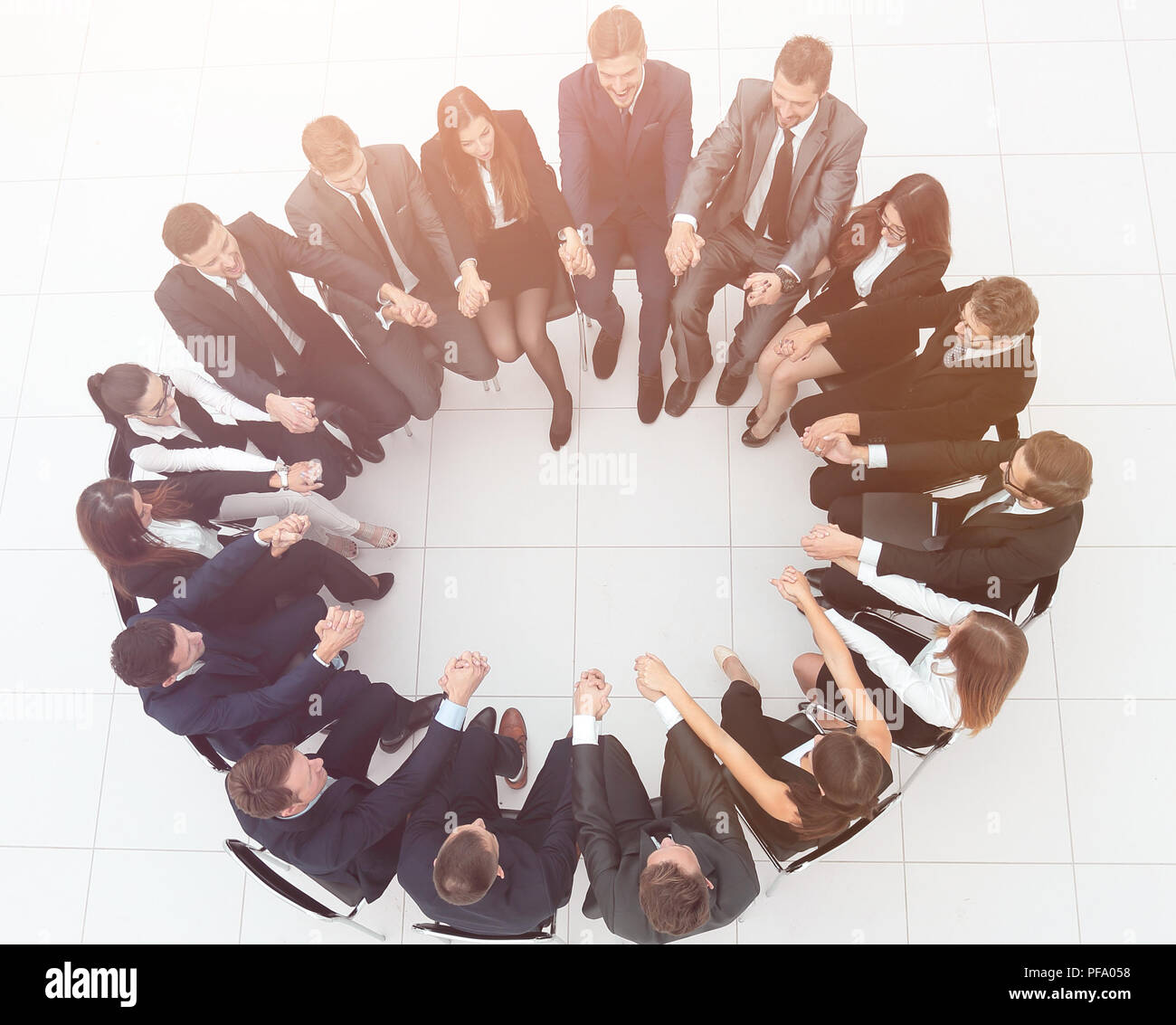 concept of team building.large business team sitting in a circle Stock ...
