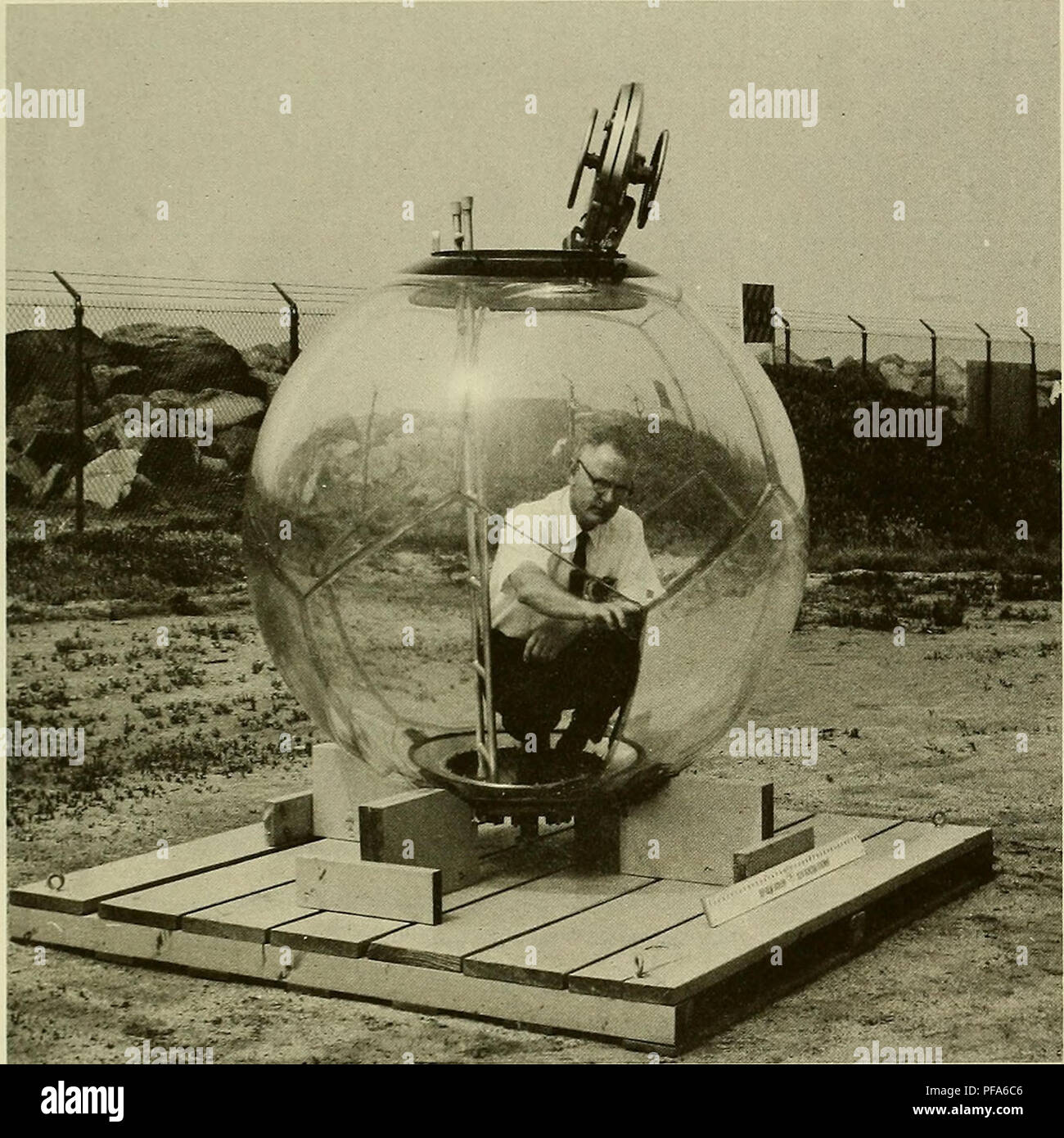 This image shows the testing of a spherical acrylic plastic pressure ...