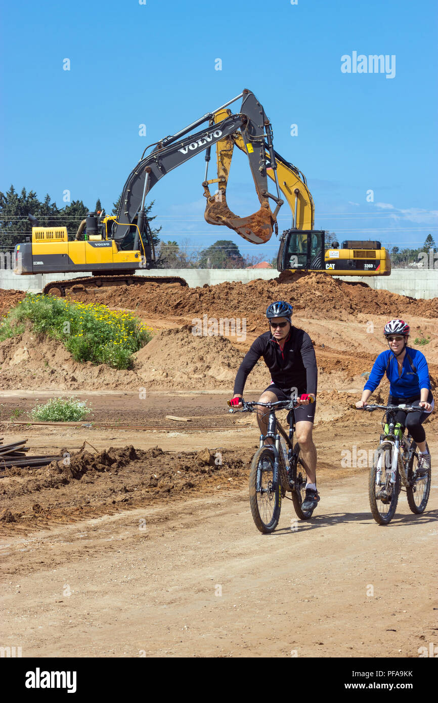 Biking in building area Stock Photo - Alamy