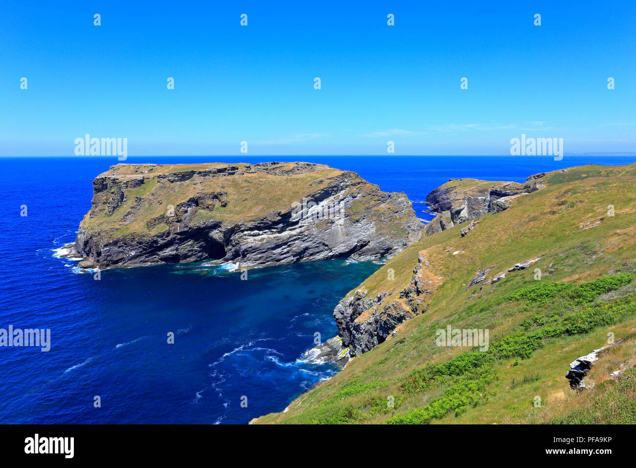 The ruins of Tintagel Castle on the peninsula of Tintagel Island from ...