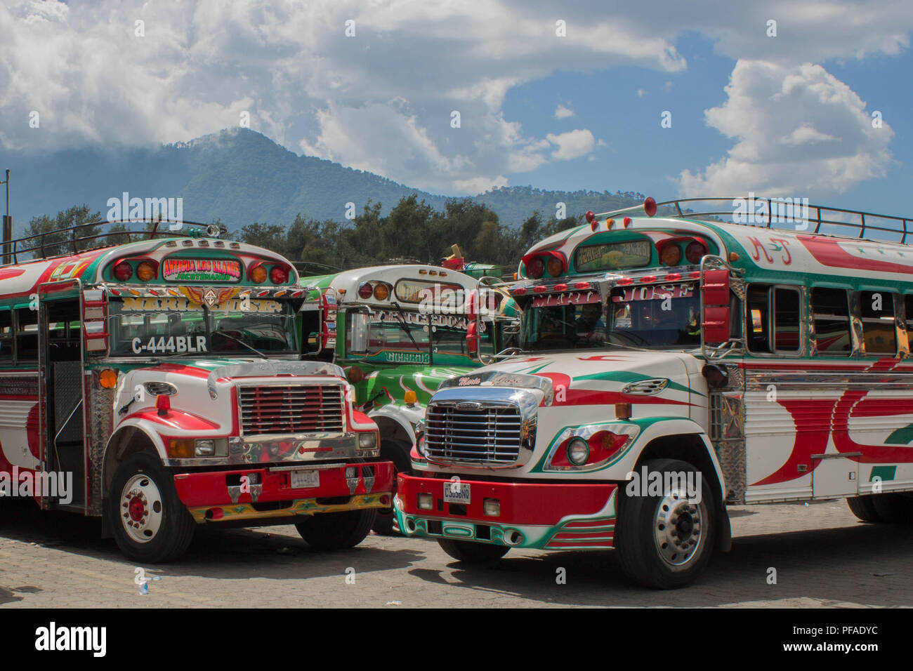 Chicken buses parked in antigua Stock Photo - Alamy
