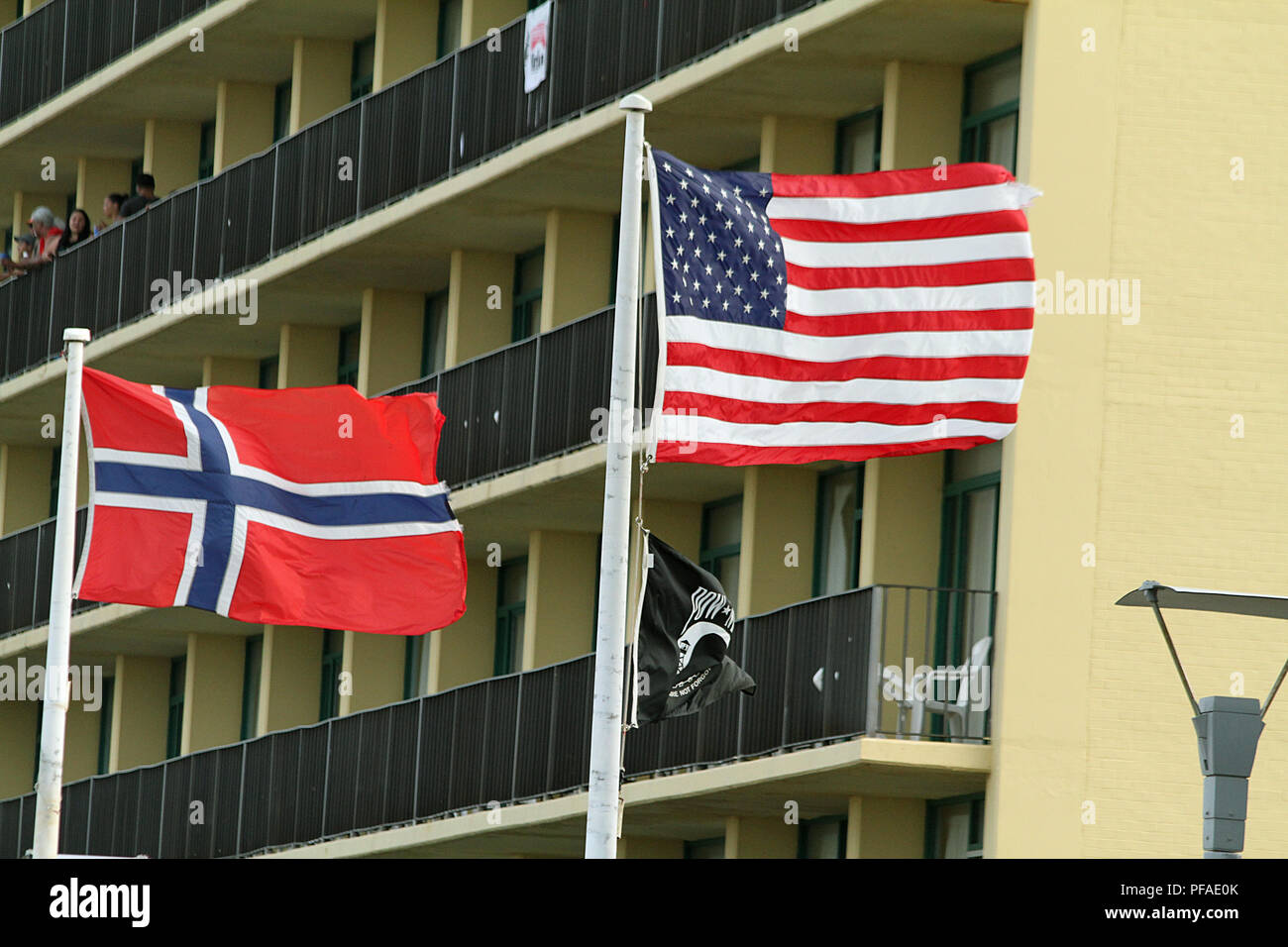 National flags waving in front of hotel on Atlantic Ave., Virginia ...