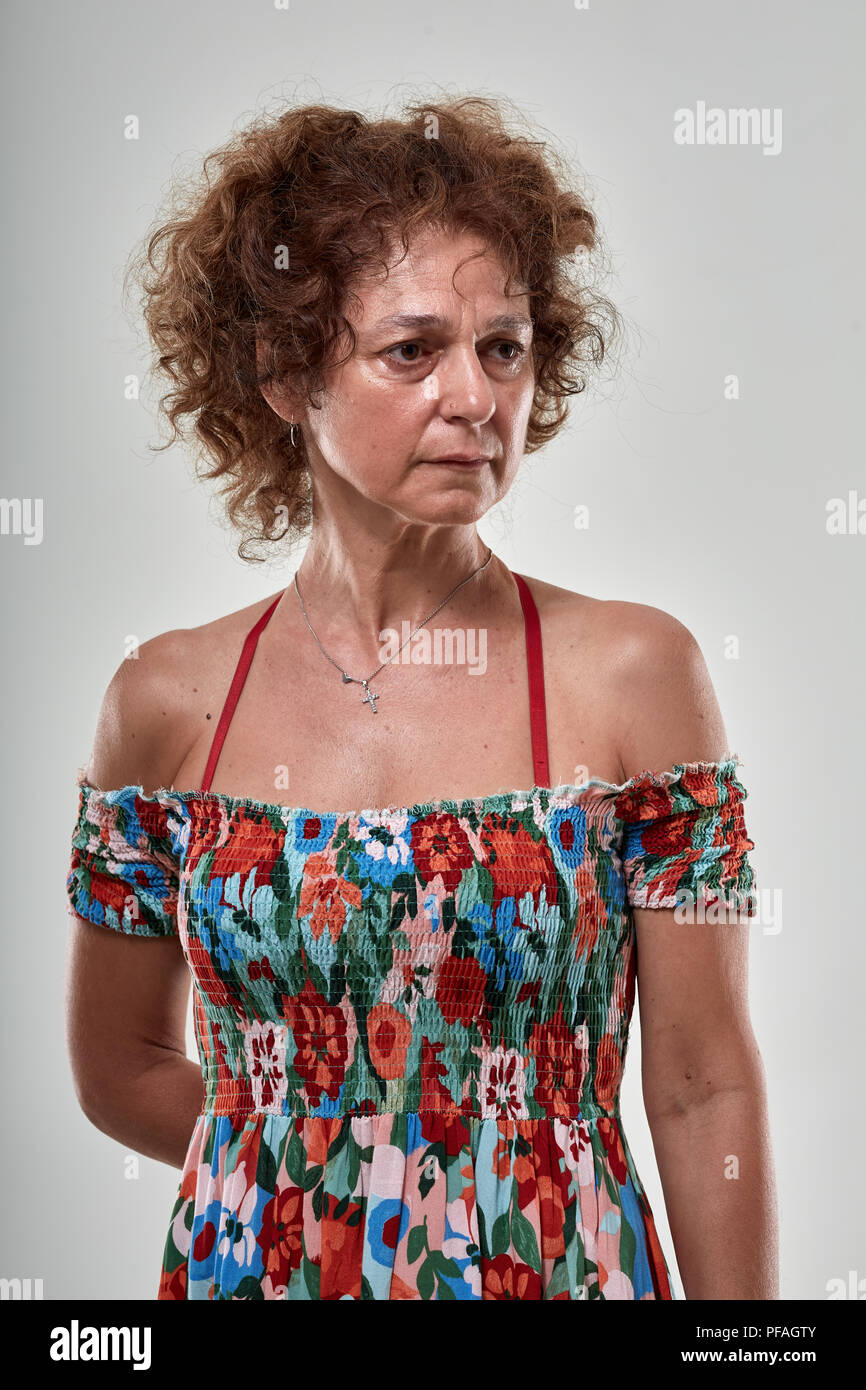 Mature caucasian woman with an expression of doubt and suspicion Stock ...