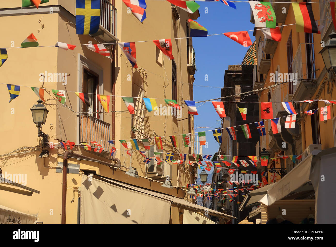 rows of flags flying across a street in Sorrento Stock Photo - Alamy