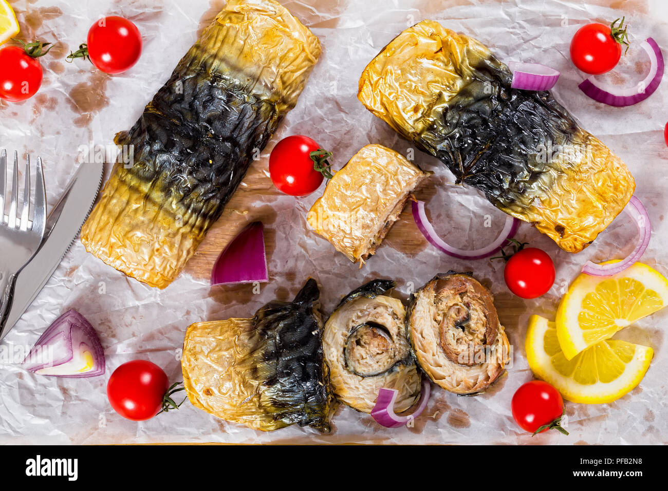 Fish cooked in parchment paper hi-res stock photography and images - Alamy