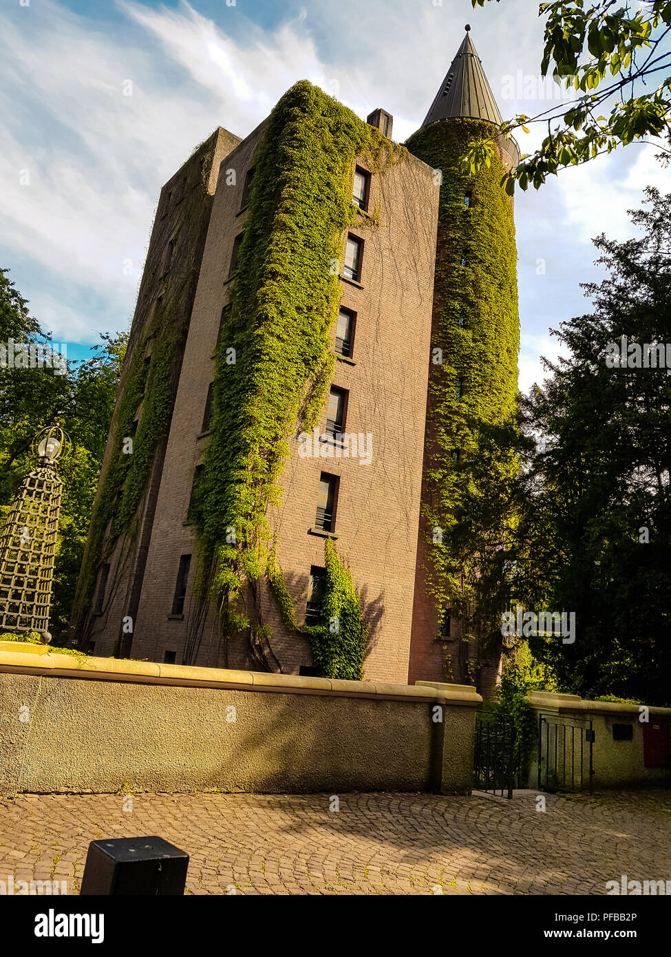 Beautiful flat high-rise block with tower Stock Photo - Alamy