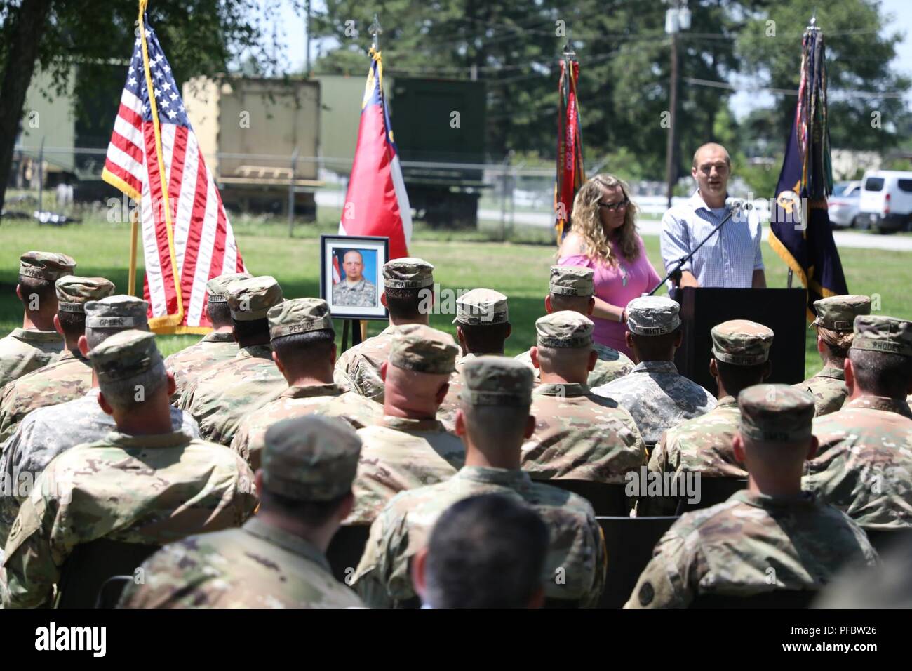The Family and of Sgt. Roger Adams speak during the dedication and re ...