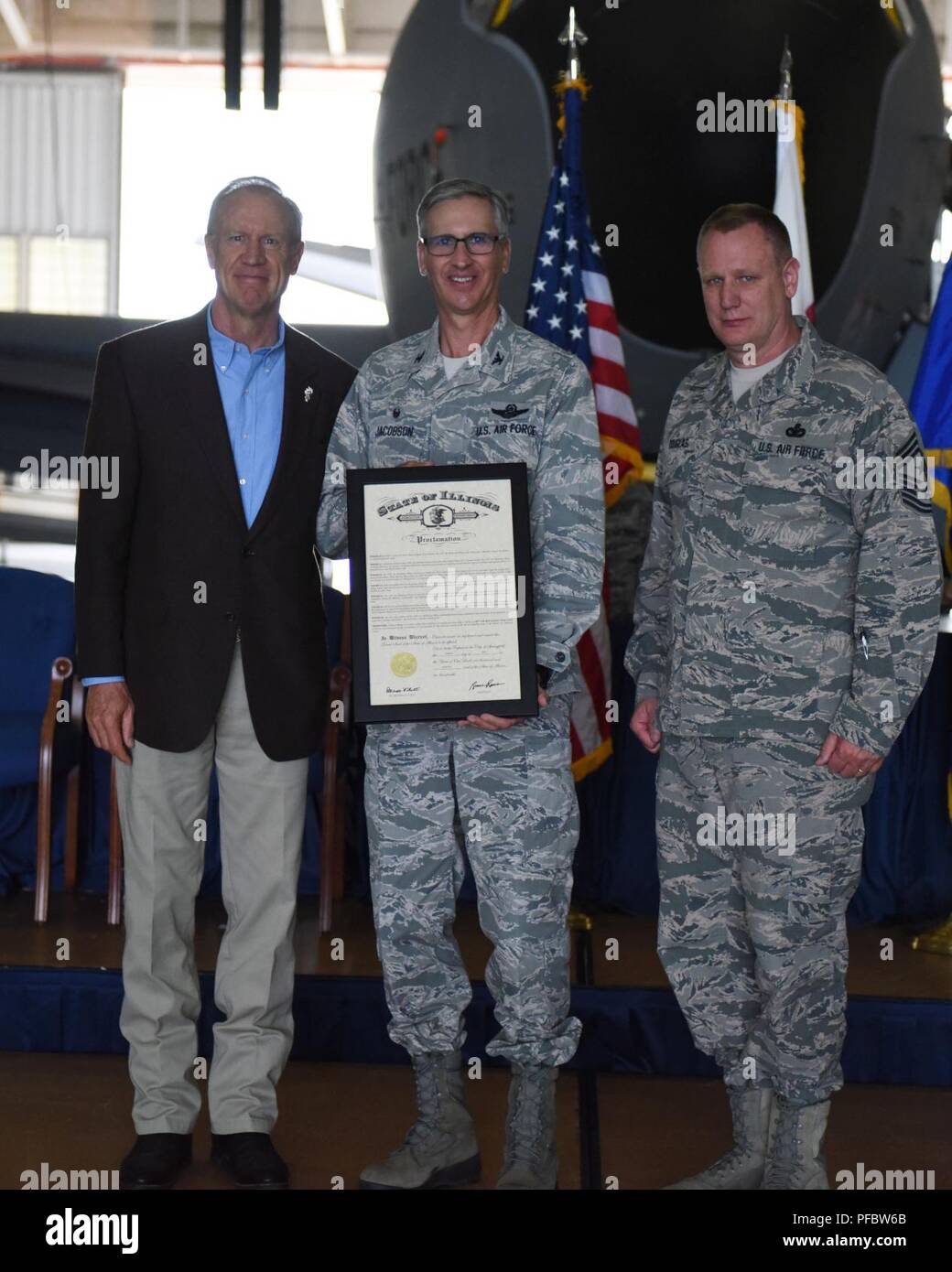 (from left) Illinois Governor Bruce Rauner presents a proclamation to ...