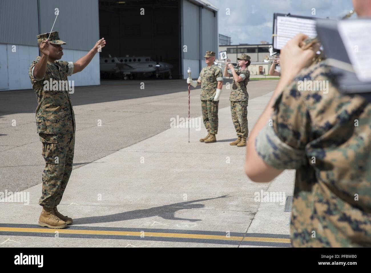 Gunnery Sgt. Justin Hauser, band master with the Marine Forces Reserve ...