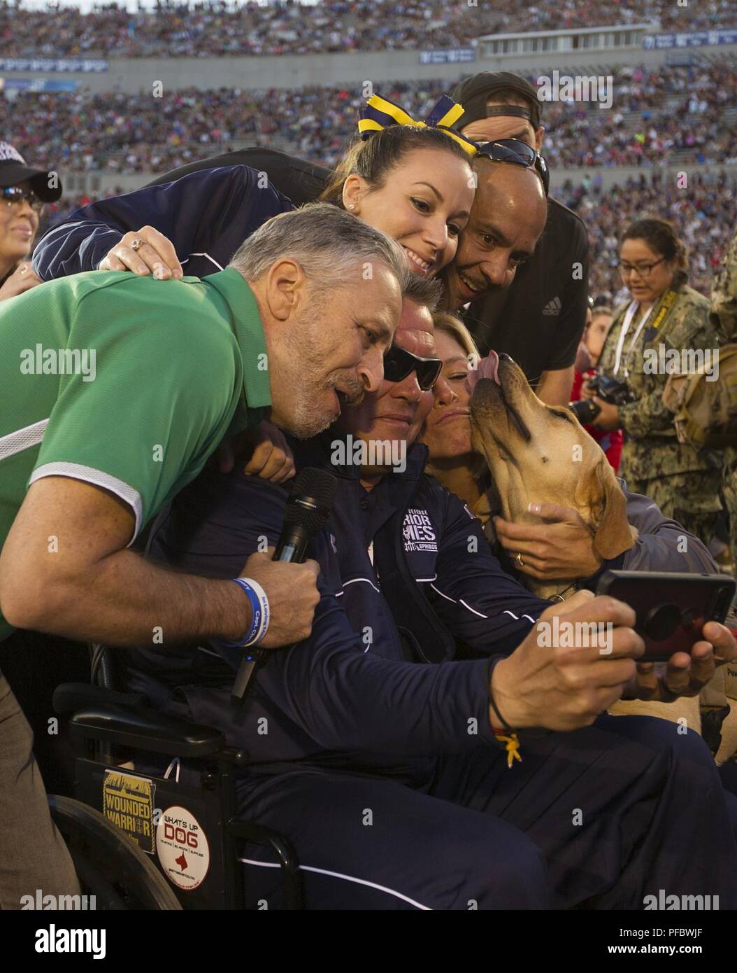 Comedian Jon Stewart and master of ceremonies, takes a selfie with ...