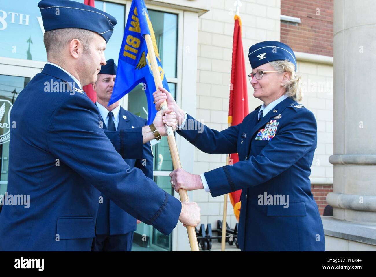 Col. Lawana Nelson receives the guideon at the change of command ...