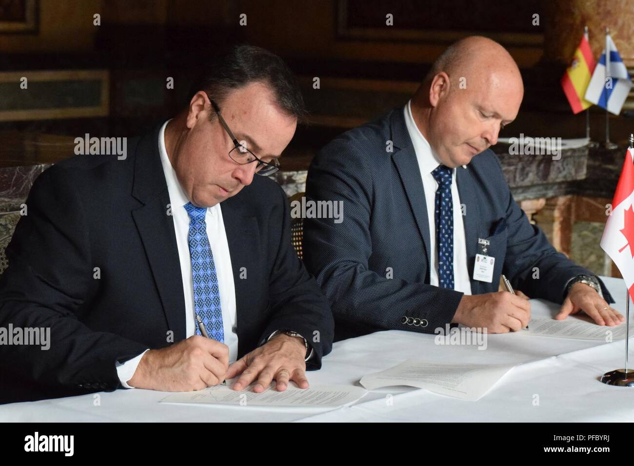 Brig. Gen. Michael Rafter of Canada, left, and Maj. Gen. Thierry Dupont ...