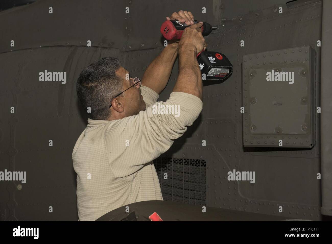U.S. Army Sgt. Julio Rivera, an UH-60 Black Hawk mechanic, Charlie ...
