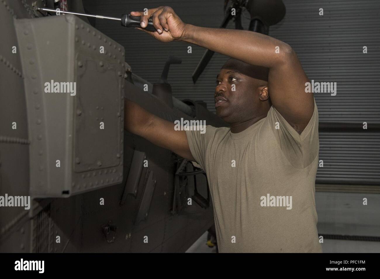 U.S. Army Sgt. Paul Berwise, an UH-60 Black Hawk mechanic, Charlie ...