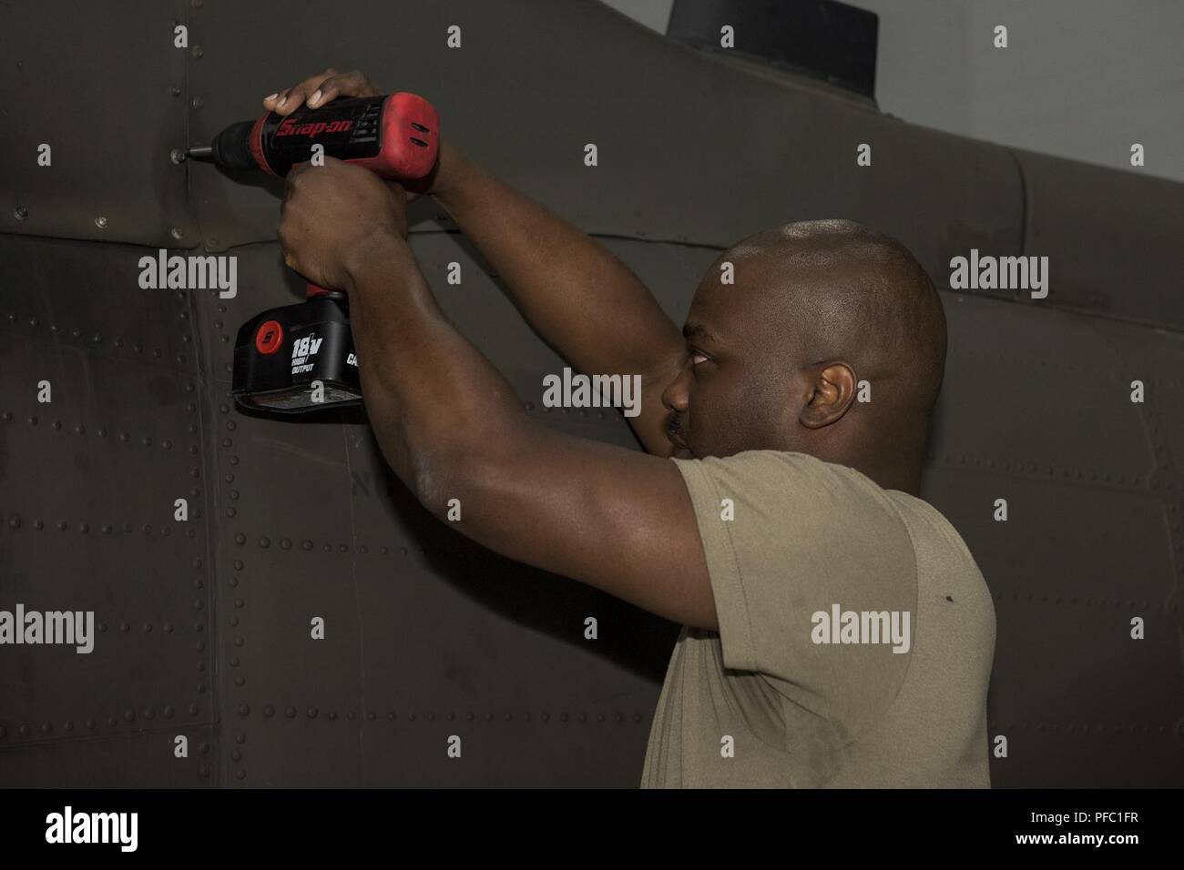 U.S. Army Sgt. Paul Berwise, an UH-60 Black Hawk mechanic, Charlie ...