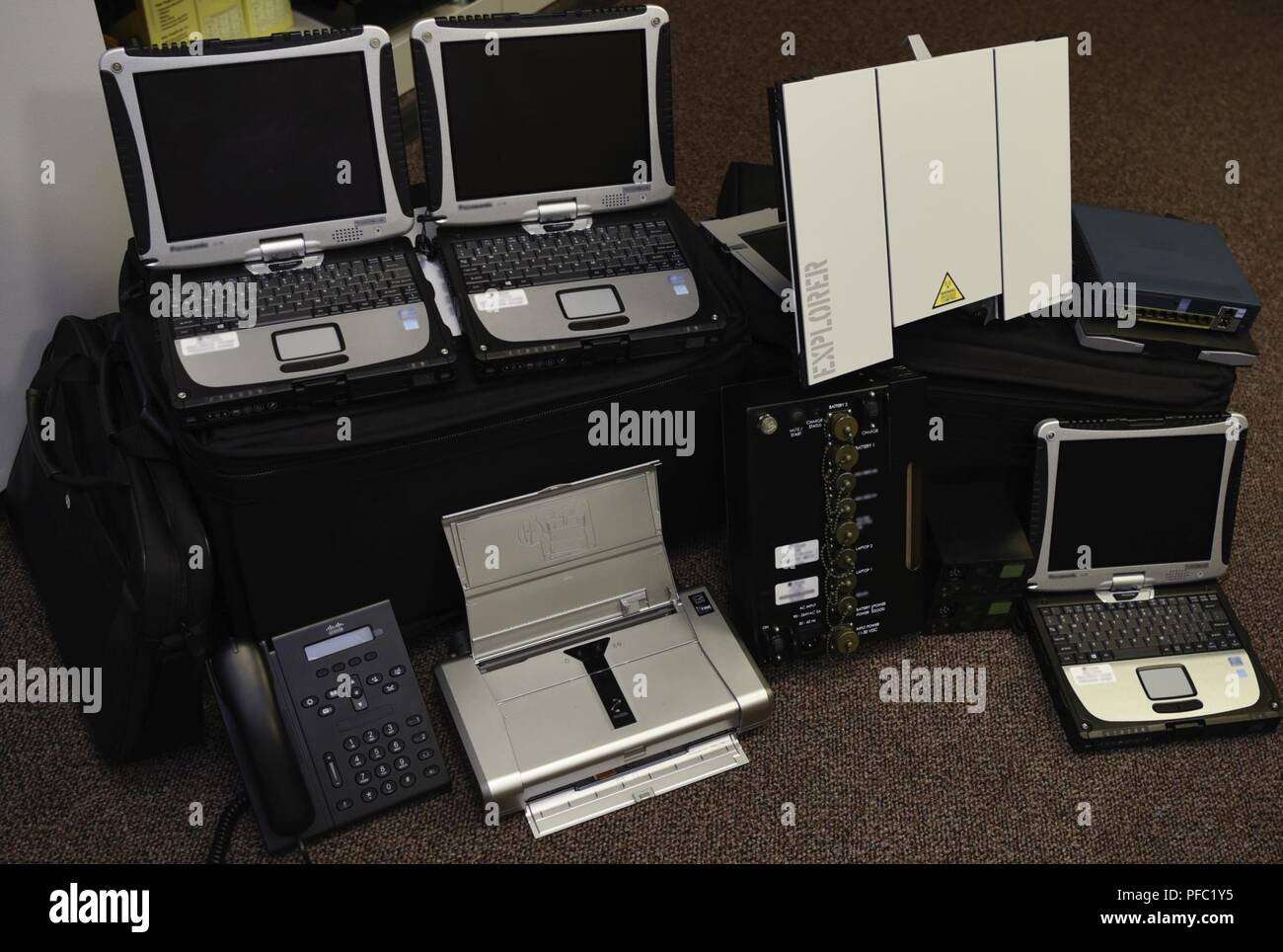 Airmen with the 823rd RED HORSE Squadron use communications fly-away ...