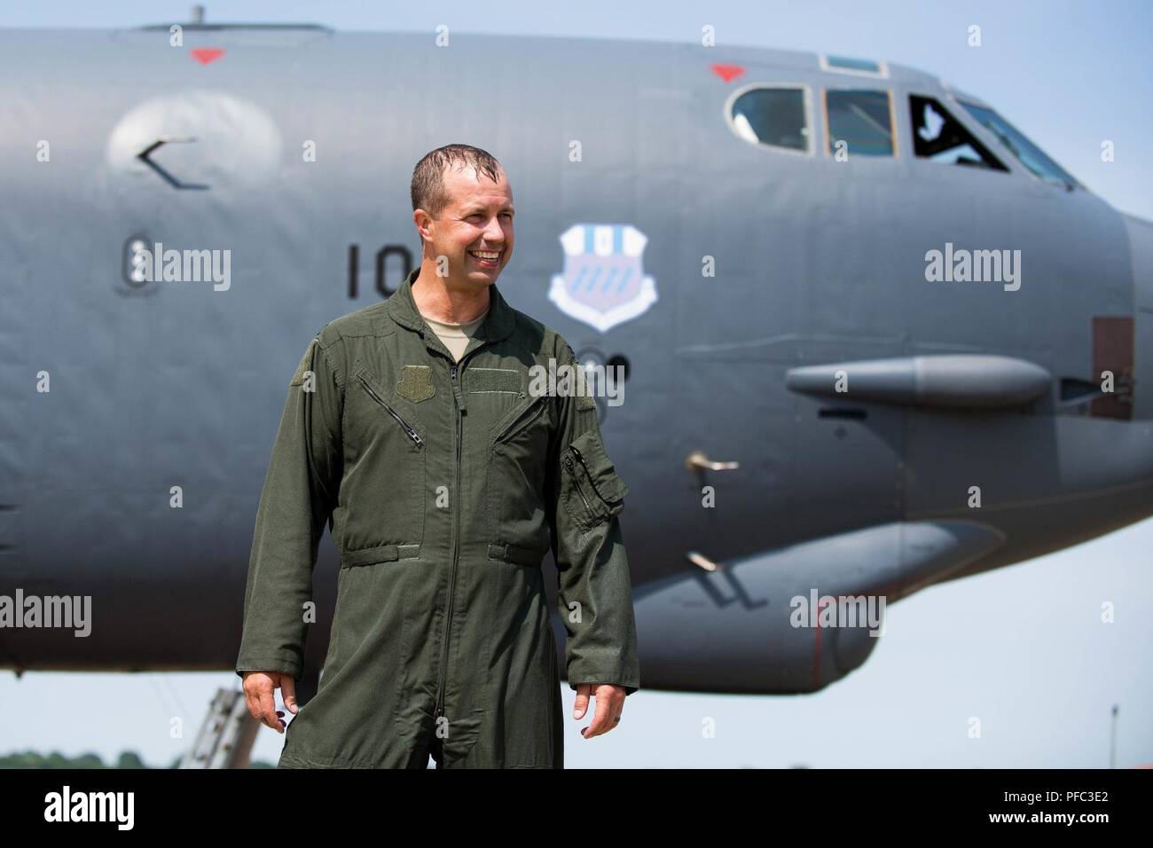Col. Ty Neuman, 2nd Bomb Wing commander, smiles after getting sprayed ...