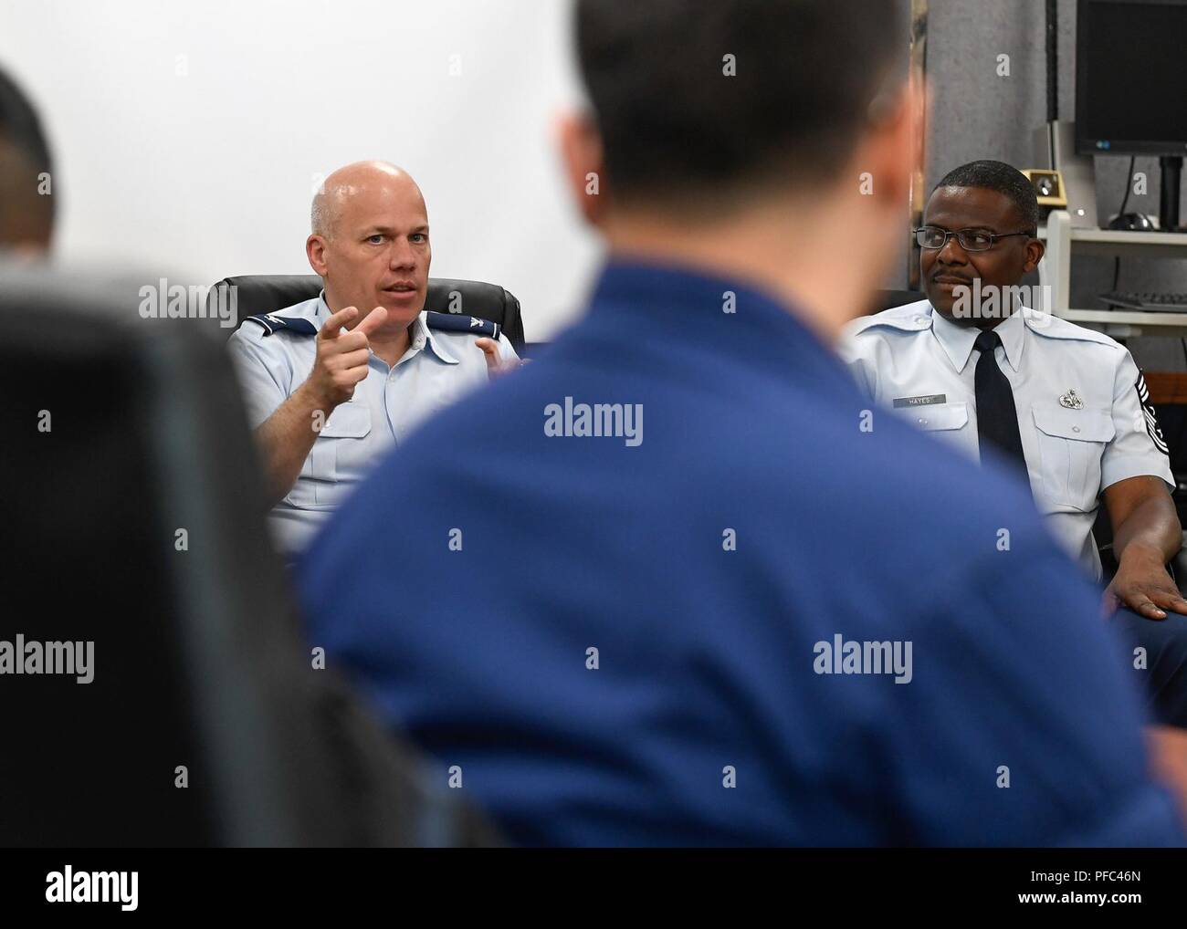 Col. Roman Hund, installation commander, and Chief Master Sgt. Henry ...