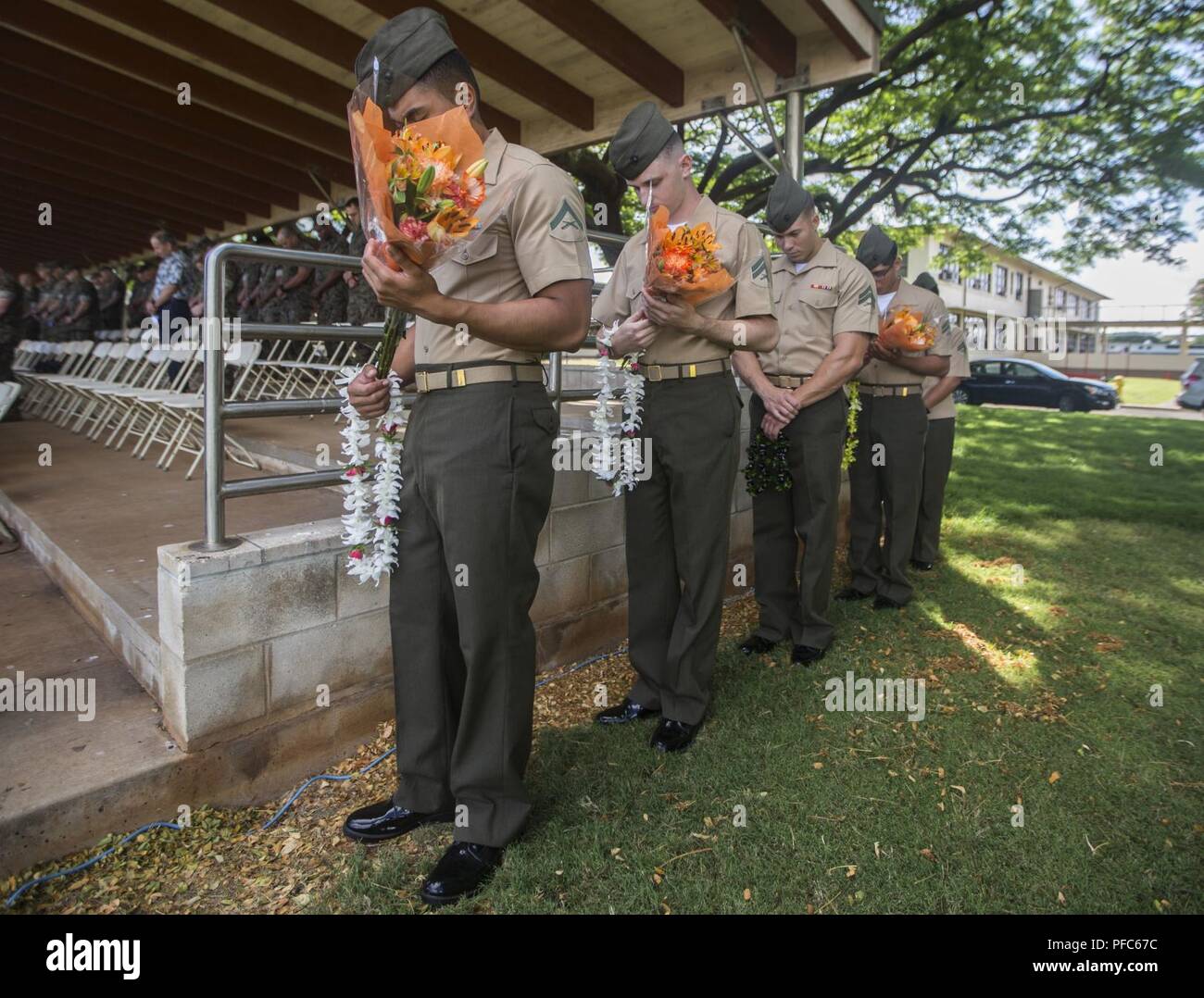 U.S. Marines with Combat Logistics Battalion 3 (CLB-3) bow their heads ...