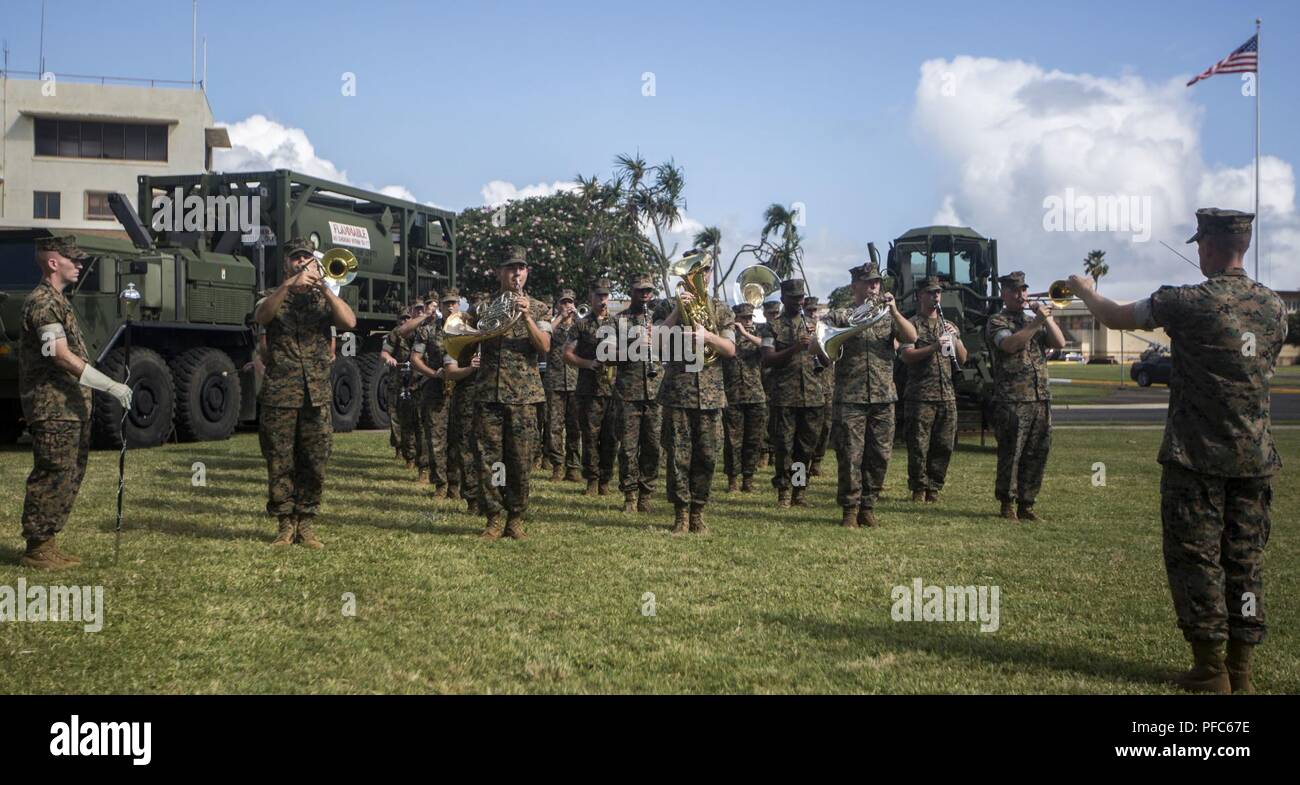 The Marine Corps Forces, Pacific Band performs during a change of ...