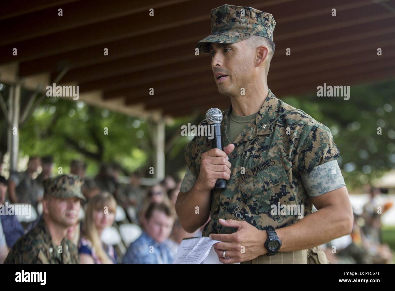 U.S. Marine Corps Lt. Col. Bolivar Pluas speaks to service members and ...