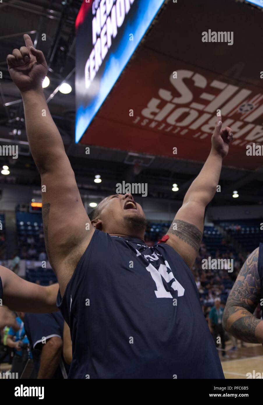 U.S. Navy Petty Officer 2nd Class Josh Laban of Team Navy celebrates ...