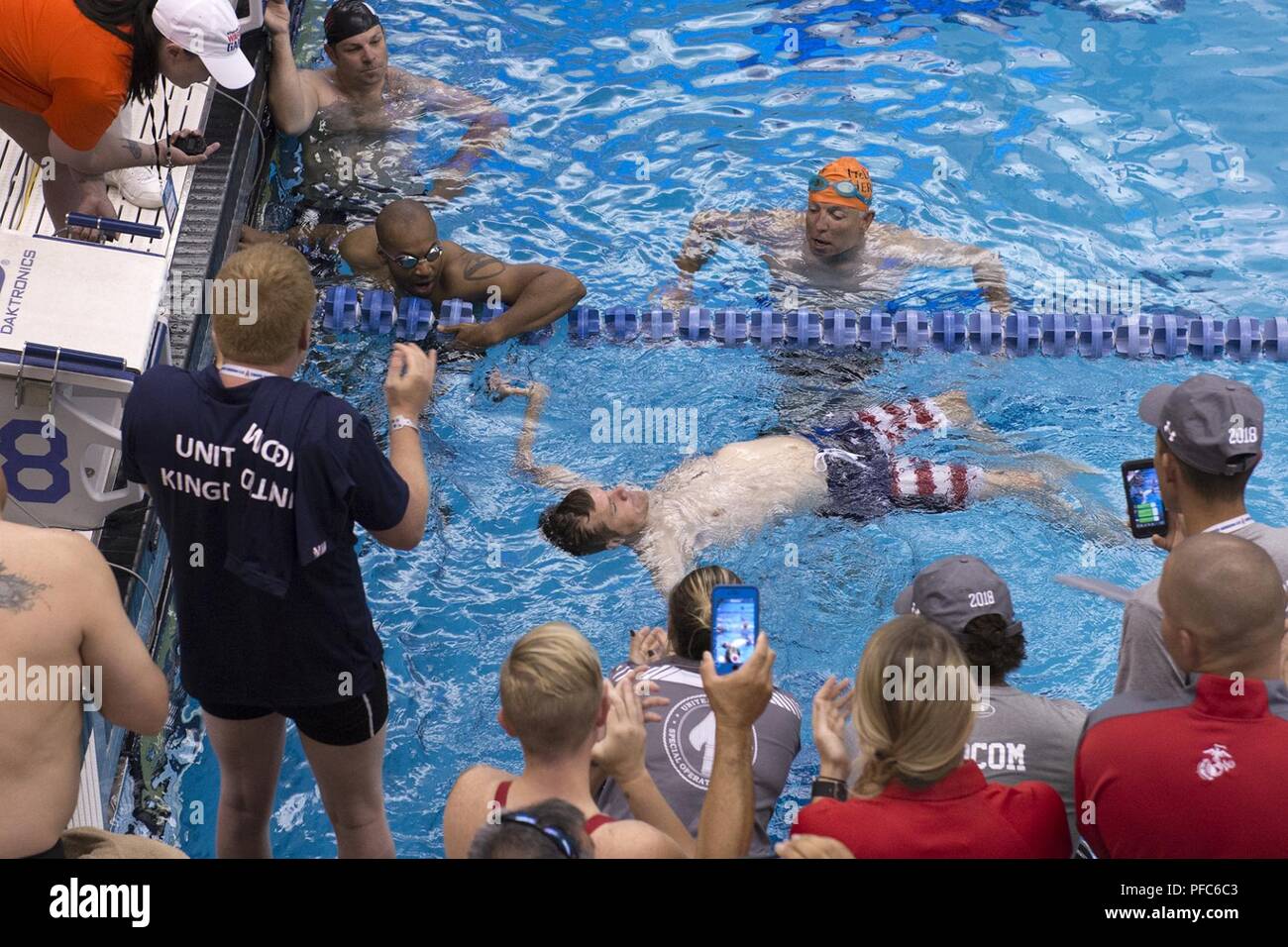 Team SOCOM veteran Capt. James Howard finishes a race in the 2018 DoD ...