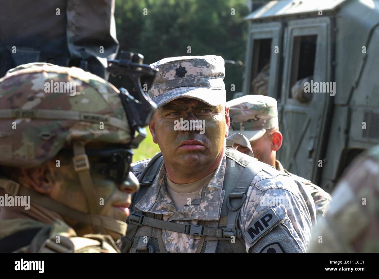 Soldiers of the 125th Military Police Battalion, based in Ponce, Puerto ...