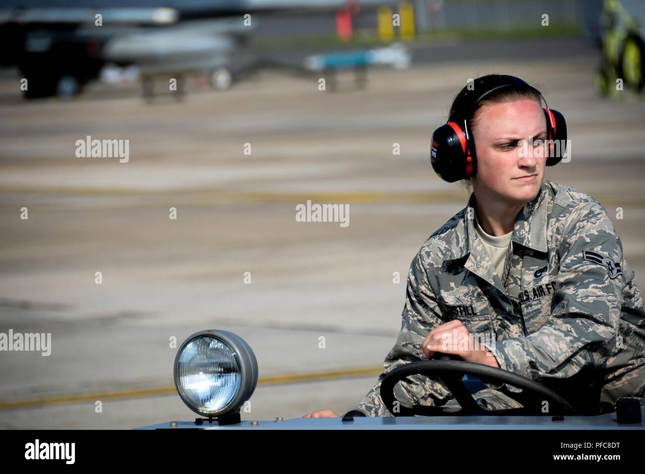 A U.S. Air Force weapons loader from the New Jersey Air National Guard ...