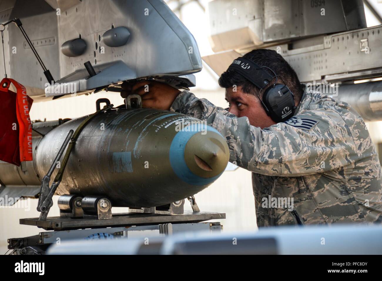 A U.S. Air Force weapons loader from the New Jersey Air National Guard ...