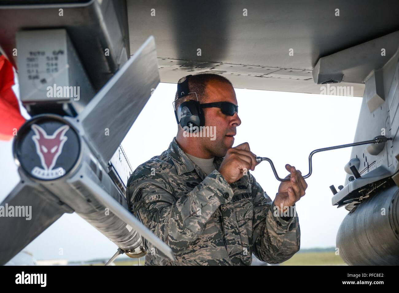 A U.S. Air Force weapons loader from the New Jersey Air National Guard ...