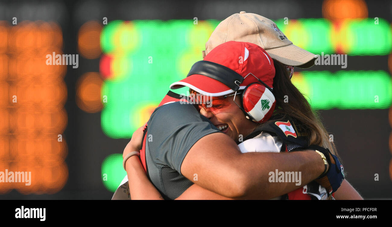 Palembang. 21st Aug, 2018. Ray Bassil (R) of Lebanon celebrates with ...