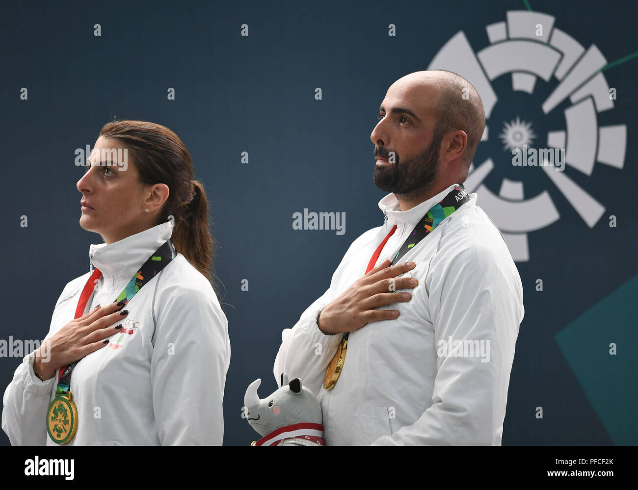 Palembang. 21st Aug, 2018. Ray Bassil (L) of Lebanon celebrates with ...