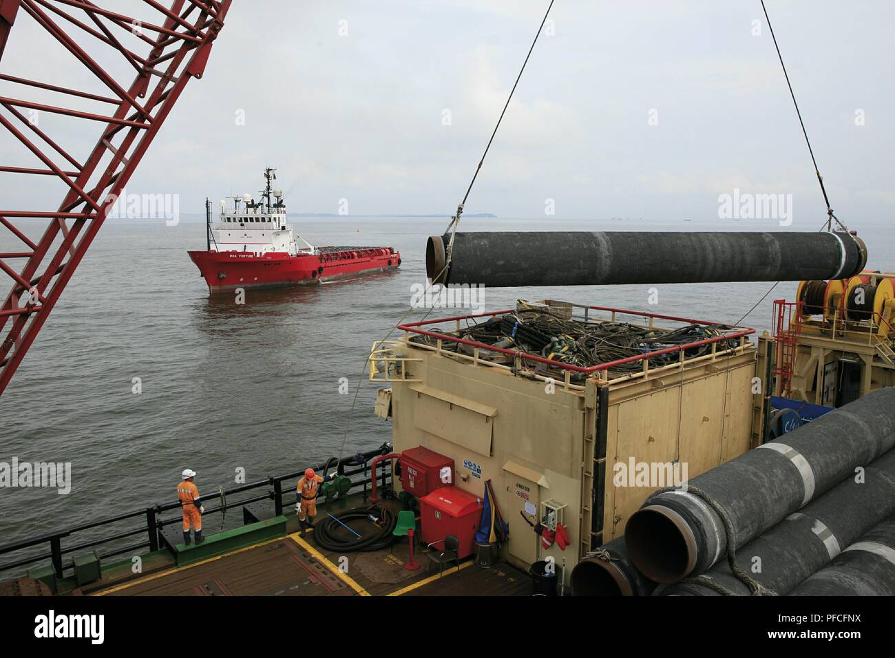 Russia. 21st Aug, 2018. Concrete coated pipes are delivered to the ...