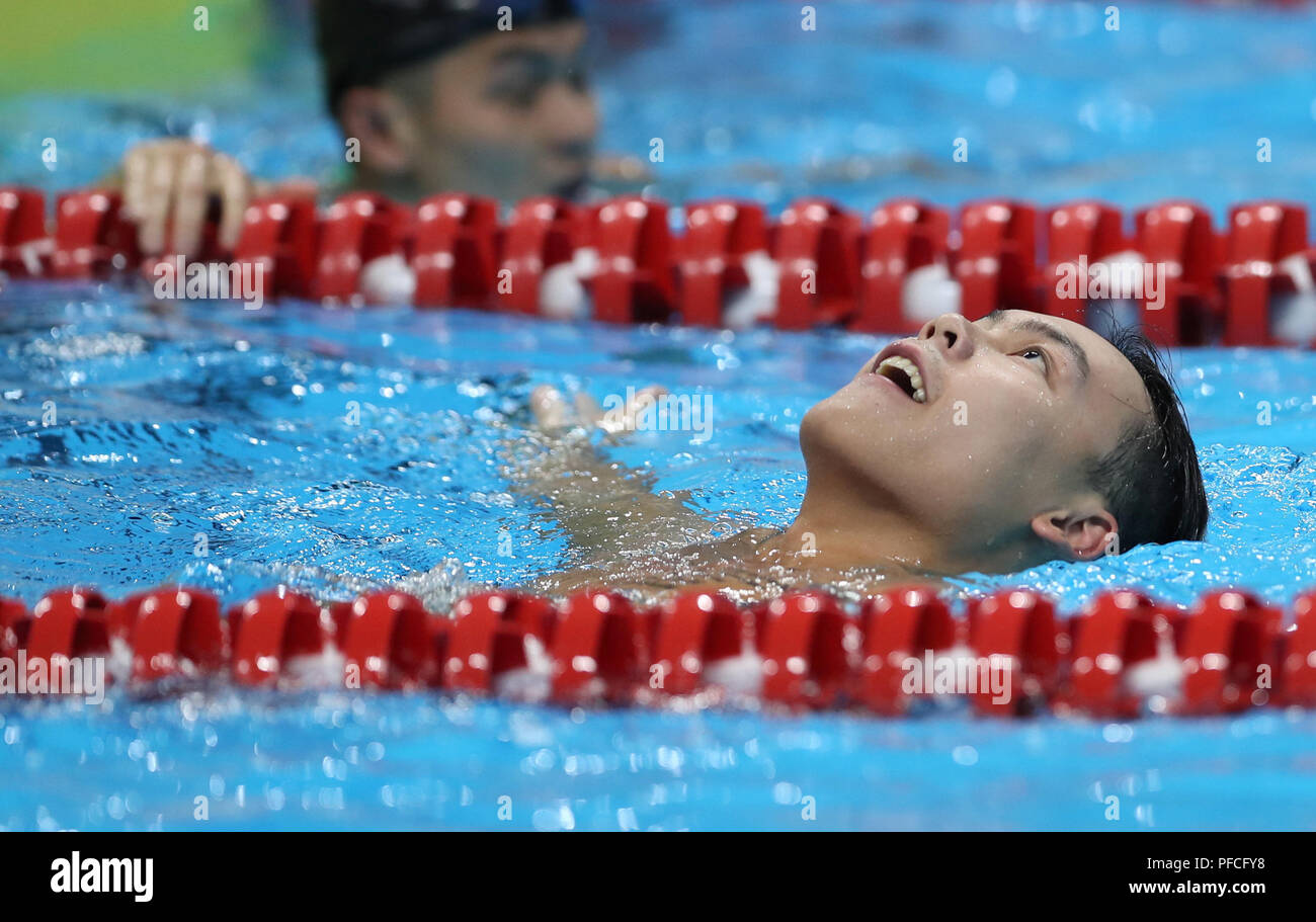 Jakarta, Indonesia. 21st Aug, 2018. Yu Hexin of China reacts after men ...