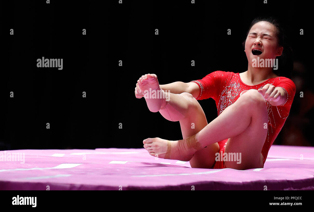 Jakarta. 21st Aug, 2018. Liu Jinru of China reacts after her fall ...