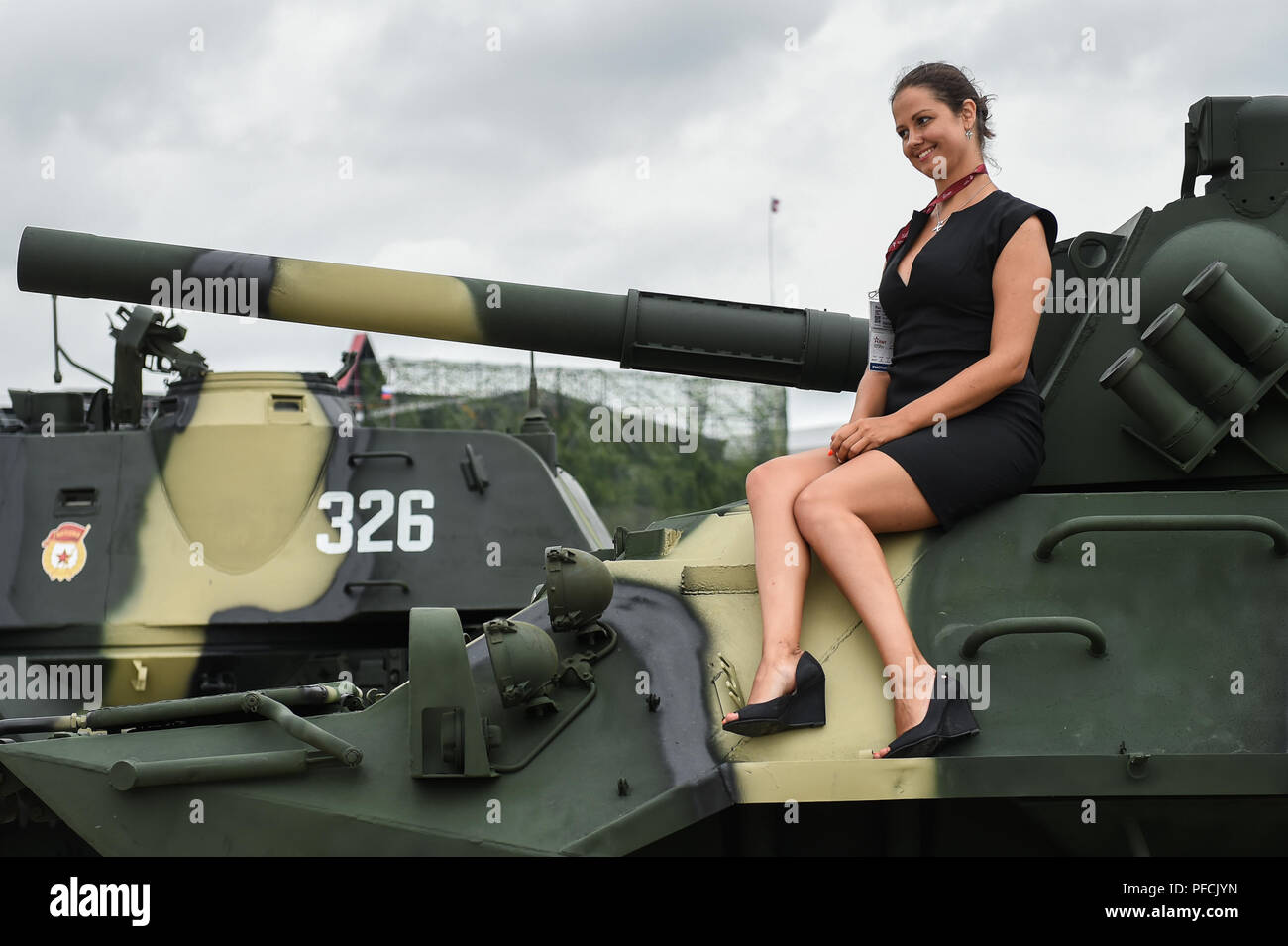 Moscow, Russia. 21st Aug, 2018. A woman poses for a photo sitting on ...