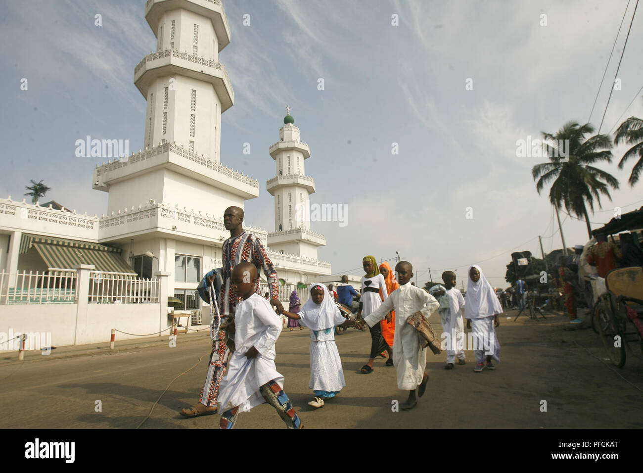 Abidjan. 21st Aug, 2018. Muslim worshipers pray to celebrate the ...