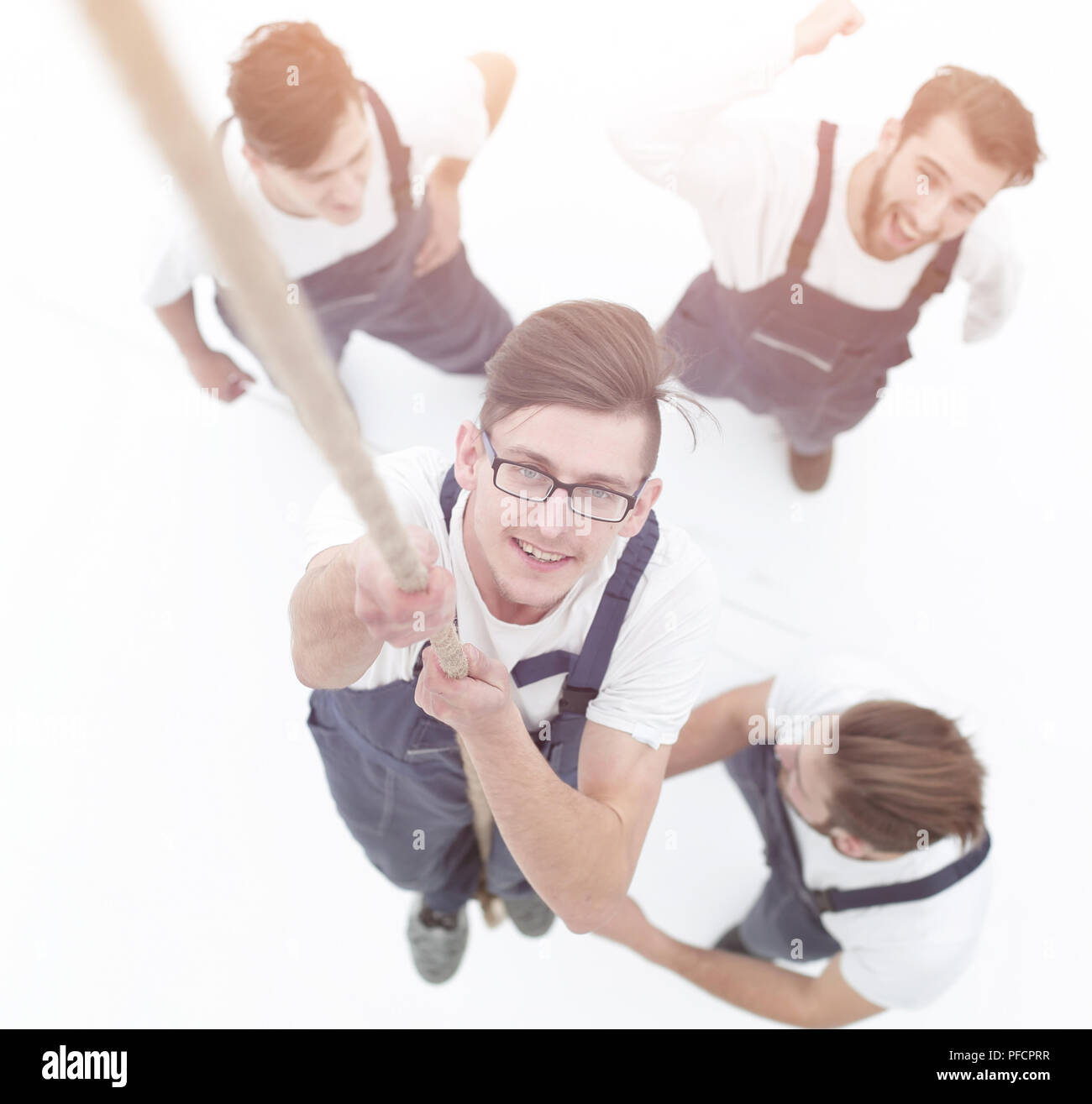 team, helping the leader to climb up the rope Stock Photo - Alamy