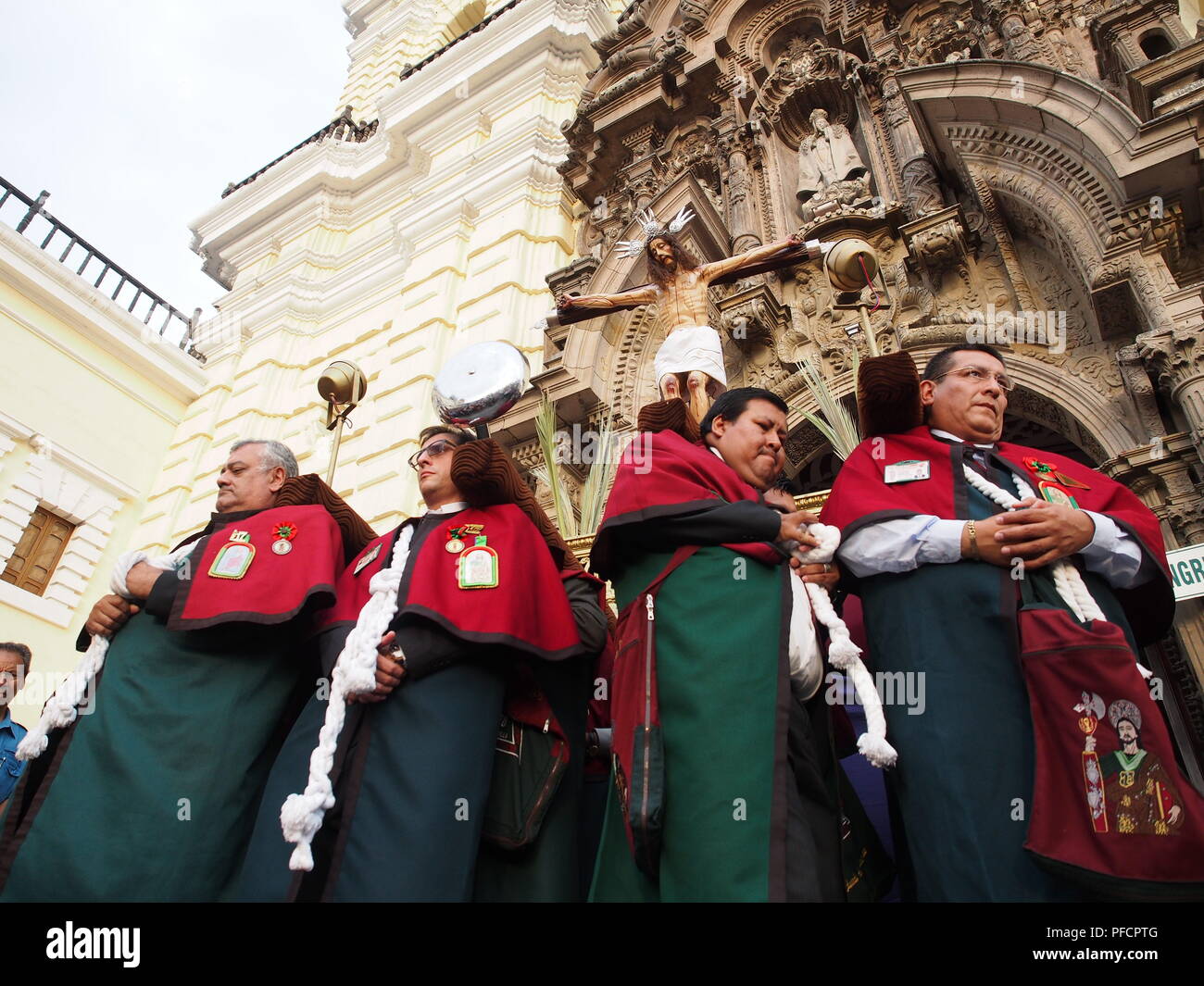 Devotees from the Saint Judas Tadeo Brotherhood, carry on a religious ...