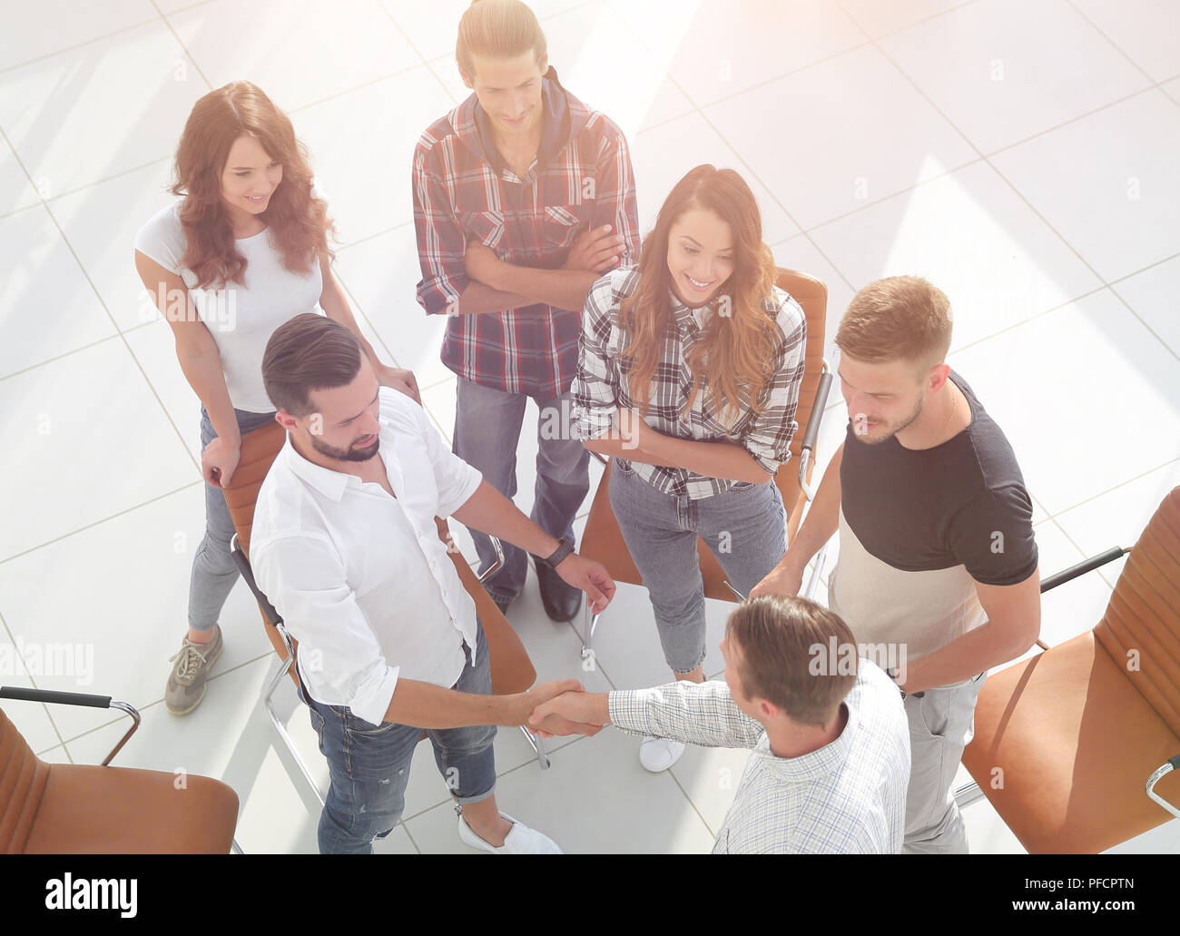 view from the top.handshake of businessmen Stock Photo - Alamy