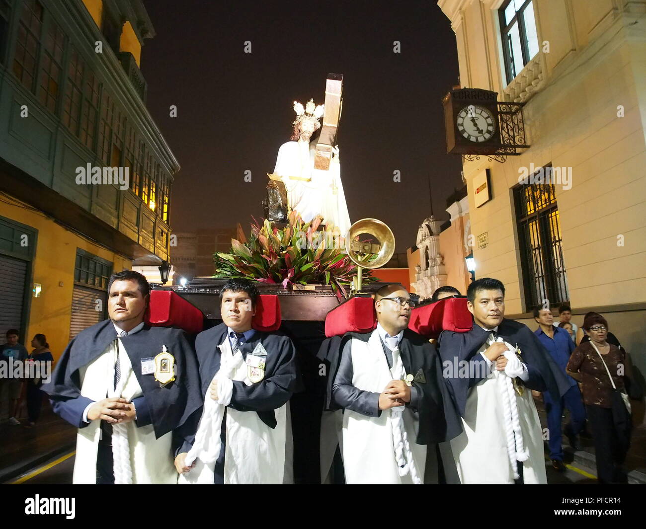 Devotees carrying on a religious procession at night called: "Steps of ...
